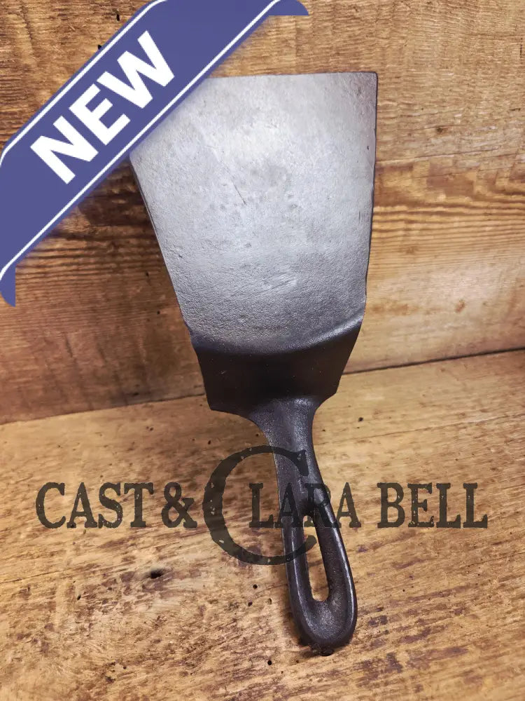 Custom made one of a kind Cast Iron Spatula. Maker unknown, but a wond ...
