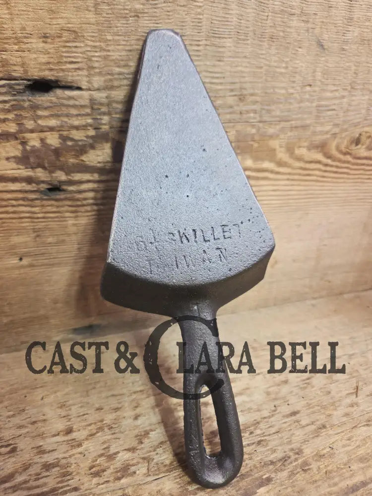 Custom made pie server, made from a repurposed skillet that was cracke ...